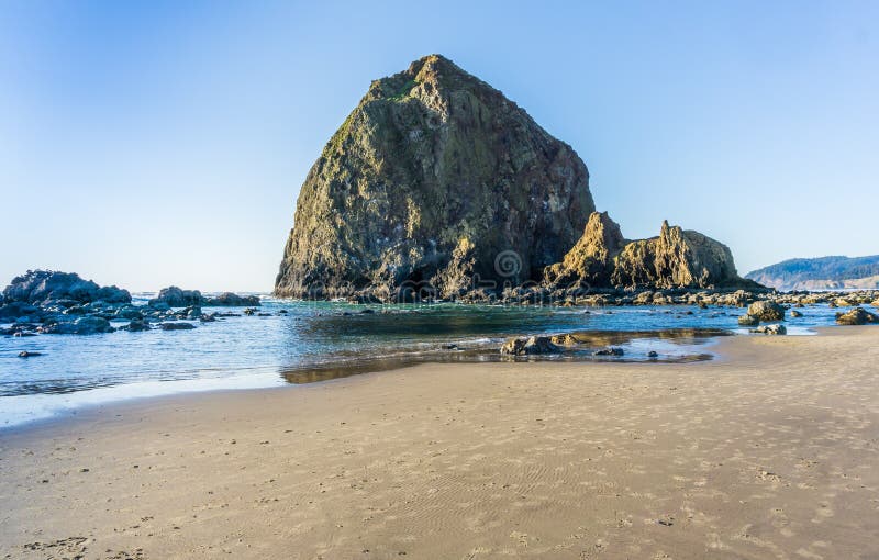 Haystack Rock Monolith 10 stock photo. Image of tide - 174866784
