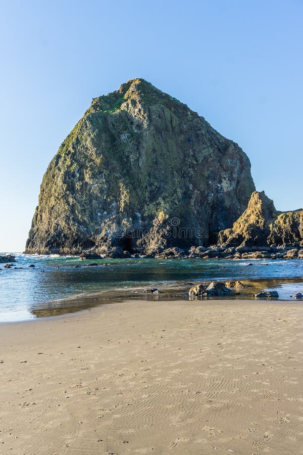 Haystack Rock Monolith 11 stock image. Image of shoreline - 175623937
