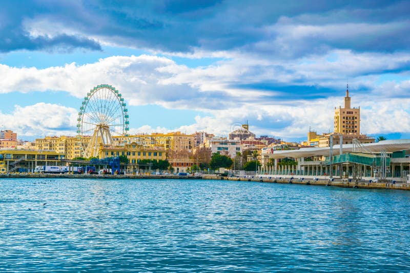 View of a Ferris Wheel Situated on a Waterfront of the Port of Malaga ...