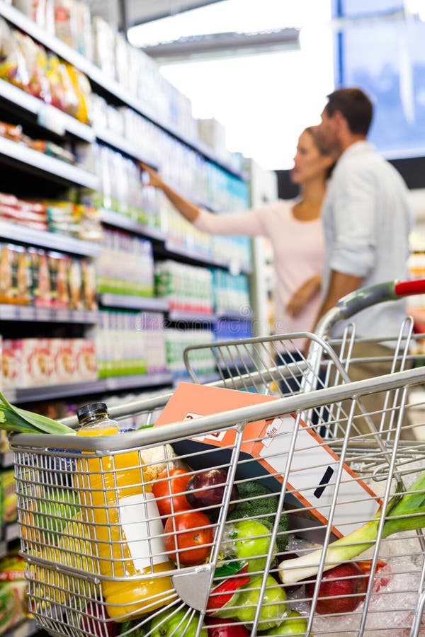 View of Filled Shopping Cart Stock Image - Image of orange ...