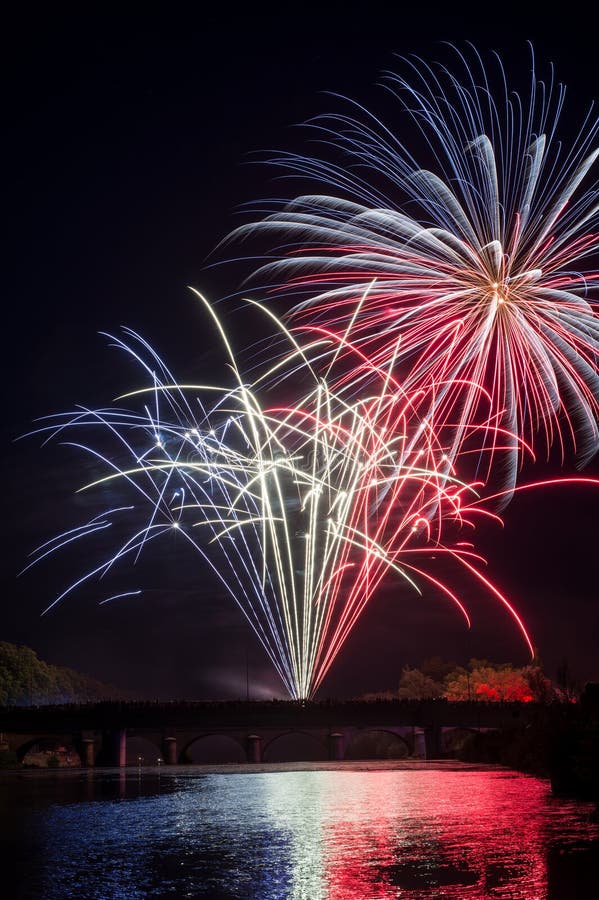 The Fireworks on Stoned Bridge on the Orb River with Reflection in ...