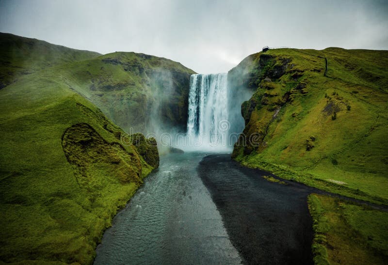 View from Flying Drone. Dramatic Midnight Sun Scene of Skogafoss ...