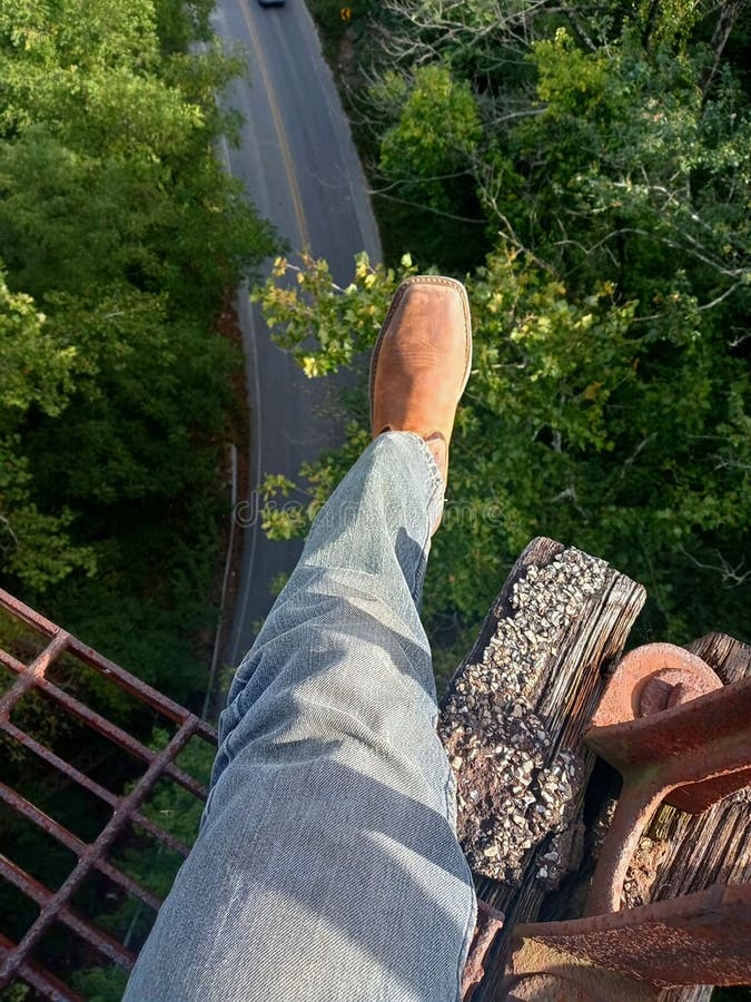 View of a Foot Leaning Over Cliff Above a Road. Editorial Image - Image ...