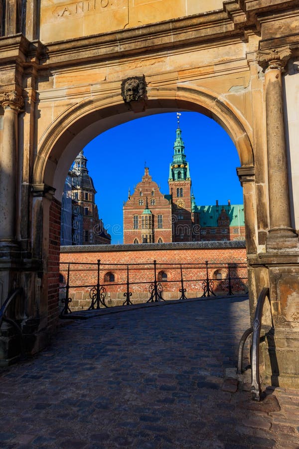 View of Frederiksborg Castle through Stone Arch in Hillerod, Denmark ...