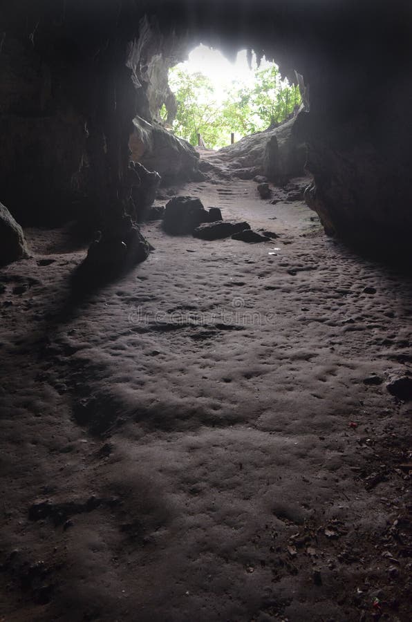 A View in Front of a Cave Entrance Stock Image - Image of deep, mood ...