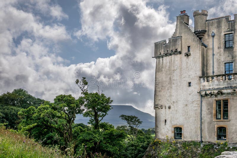A View of the Front Corner of Dunvegan Castle Surrounded by Trees Stock ...