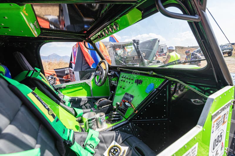 View of the Front Panel of a Racing SUV with Many Special Toggle ...