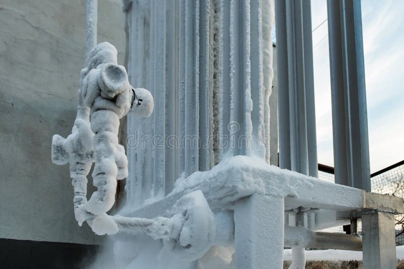 View of a frozen pipelines stock photo. Image of construction - 259054478