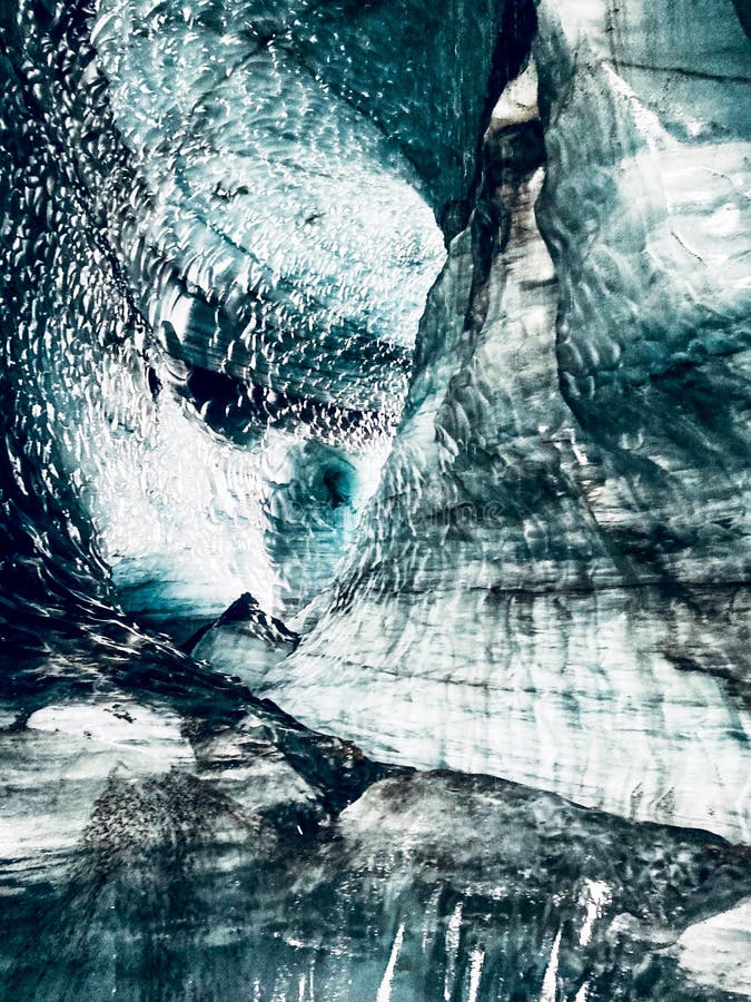 View into a Glacier Cave, with Ash Layers and Ice, in Iceland Stock ...