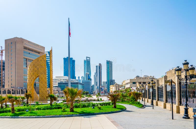 View of a a Golden Monument with a Small Park in the Central Kuwait ...