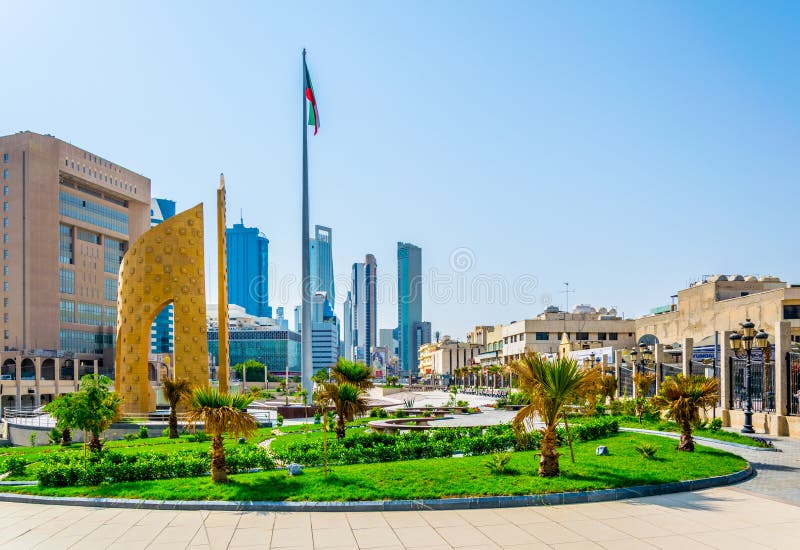 View of a a Golden Monument with a Small Park in the Central Kuwait ...