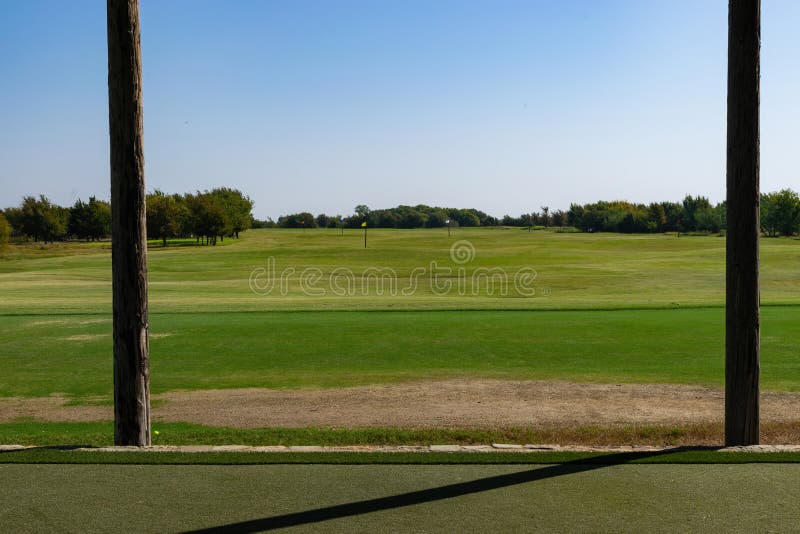 View from a Golf Driving Range Tee Box Flanked by Two Posts Stock Image ...