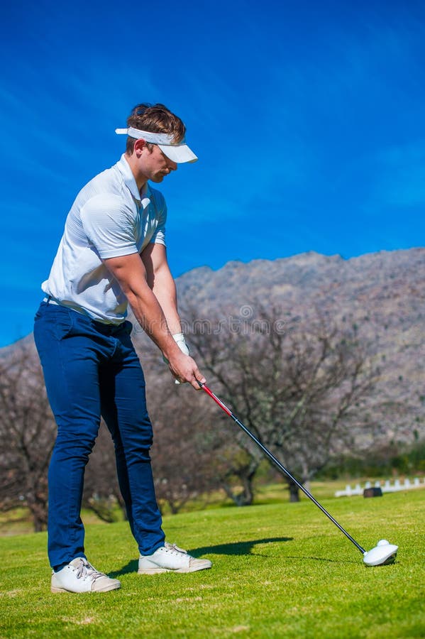 View of a Golfer Teeing Off from a Golf Tee Stock Photo - Image of ...