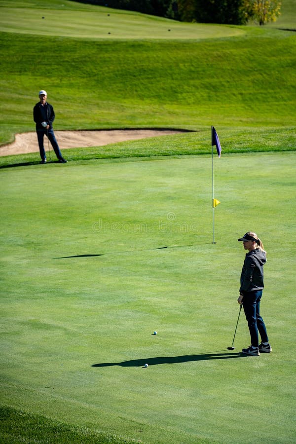 View of Golfers Playing on a Golf Course. Editorial Stock Image - Image ...