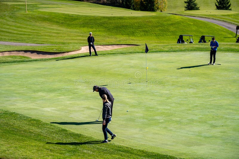 View of Golfers Playing on a Golf Course. Editorial Photography - Image ...