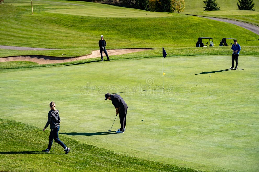 View of Golfers Playing on a Golf Course. Editorial Photo - Image of ...