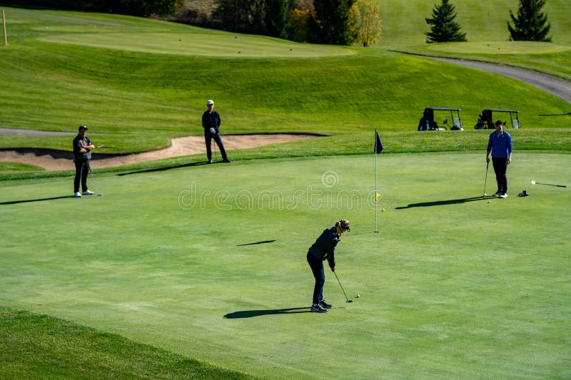 View of Golfers Playing on a Golf Course. Editorial Stock Image - Image ...
