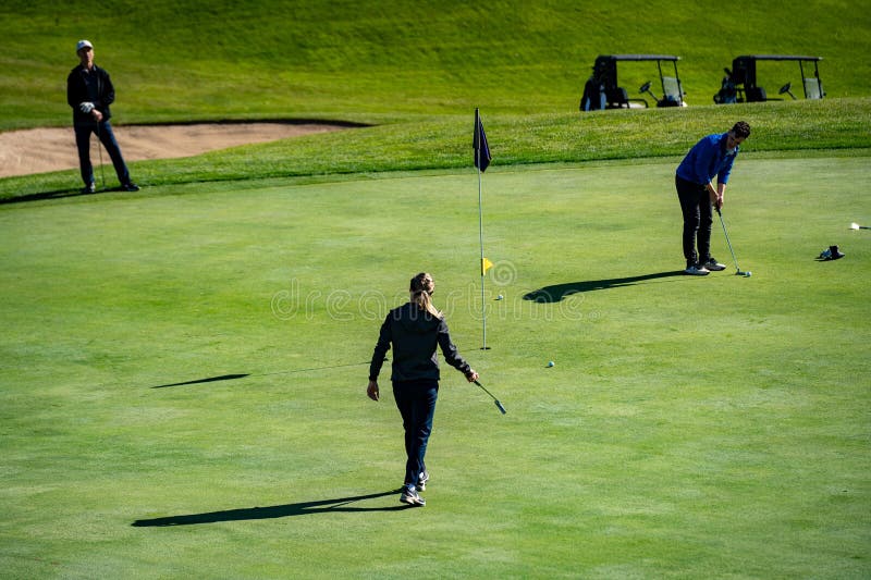 View of Golfers Playing on a Golf Course. Editorial Image - Image of ...