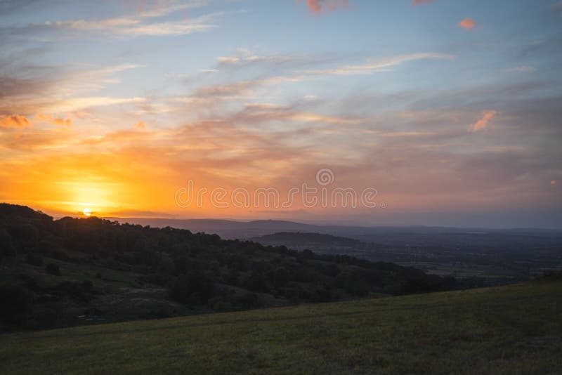 View of the Green Hillside at Beautiful Sunset. Stock Photo - Image of ...