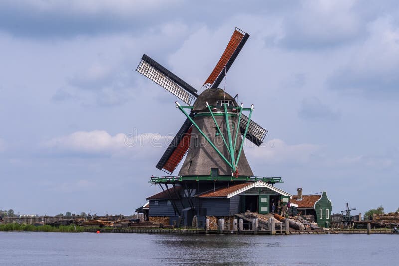 View of a Green Painted Working Mill on a River . Stock Image - Image ...