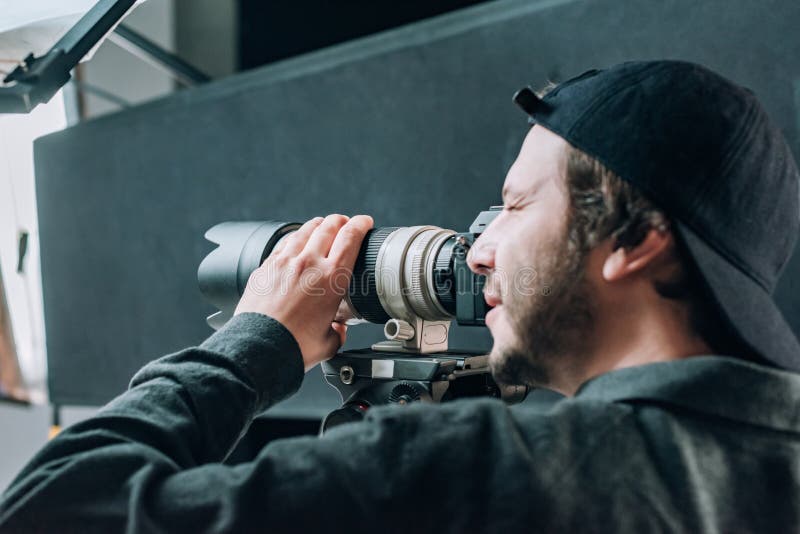 View of Handsome Cameraman Working in Photo Studio Stock Image - Image ...