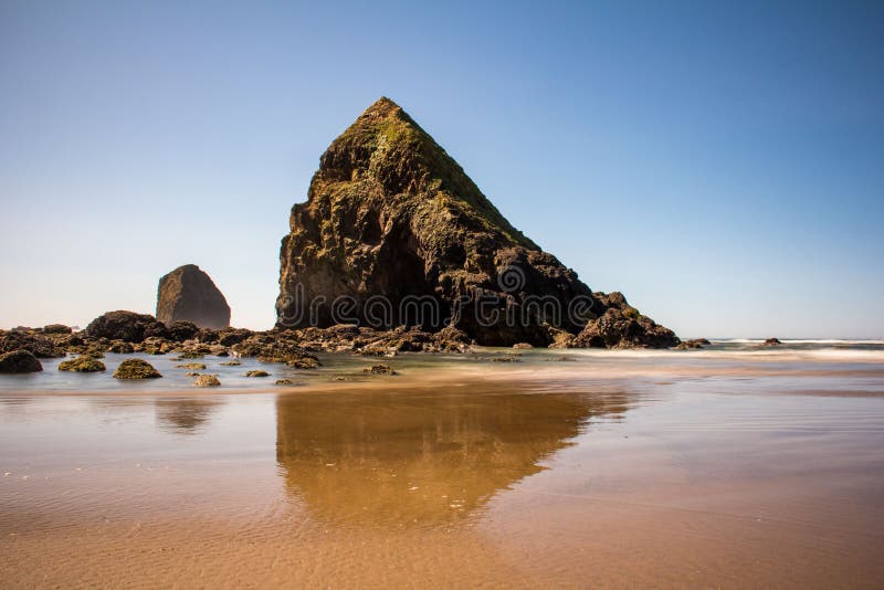 View of the Haystack Rock at the Canon Beach in Oregon Stock Image ...