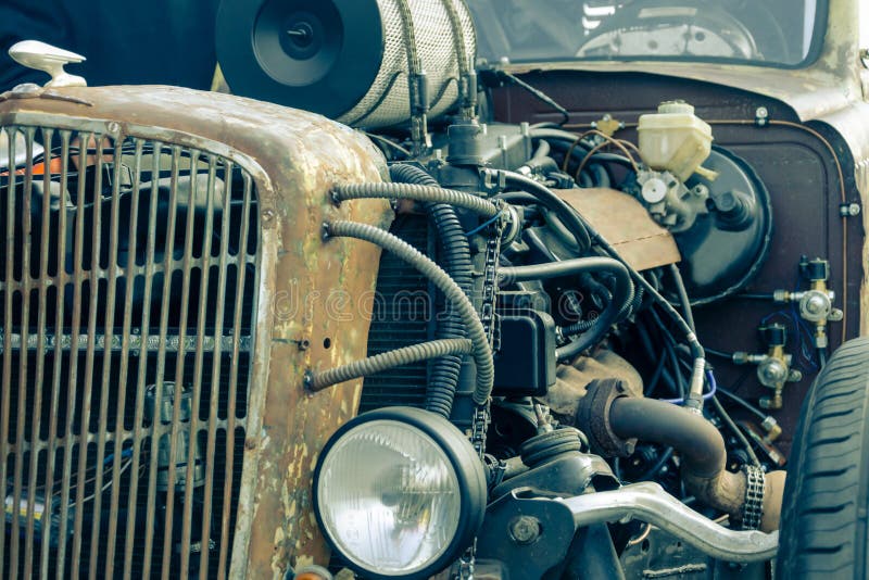View of the Headlights and Engine Compartment of a Powerful and Rusty ...
