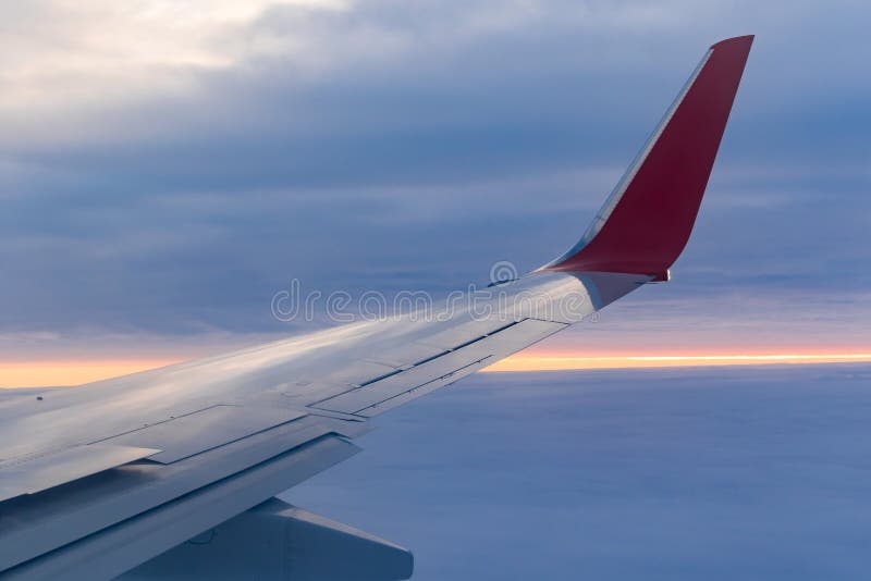 View from a Height Above the Clouds from the Plane`s Window. Part of an ...