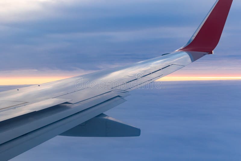 View from a Height Above the Clouds from the Plane`s Window. Part of an ...