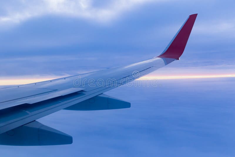 View from a Height Above the Clouds from the Plane`s Window. Part of an ...