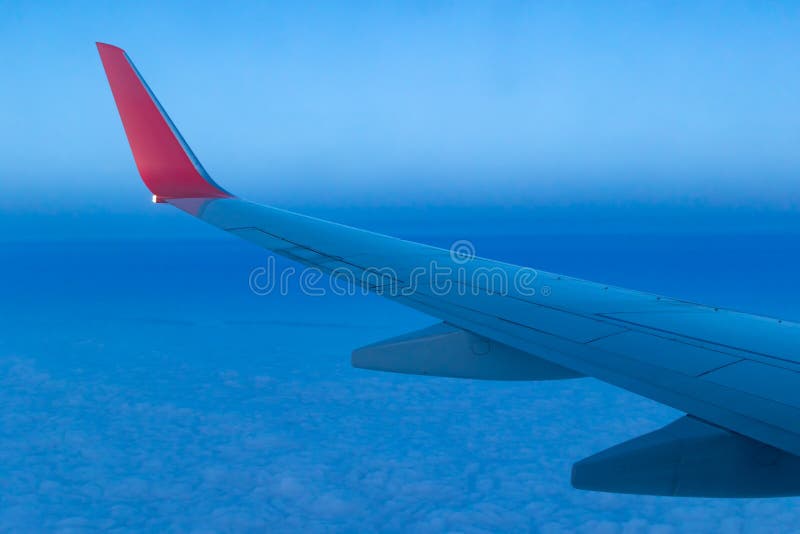 View from a Height Above the Clouds from the Plane`s Window. Part of an ...
