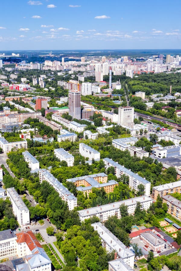 View from a Height of a Modern City. City Panorama among Green Trees ...