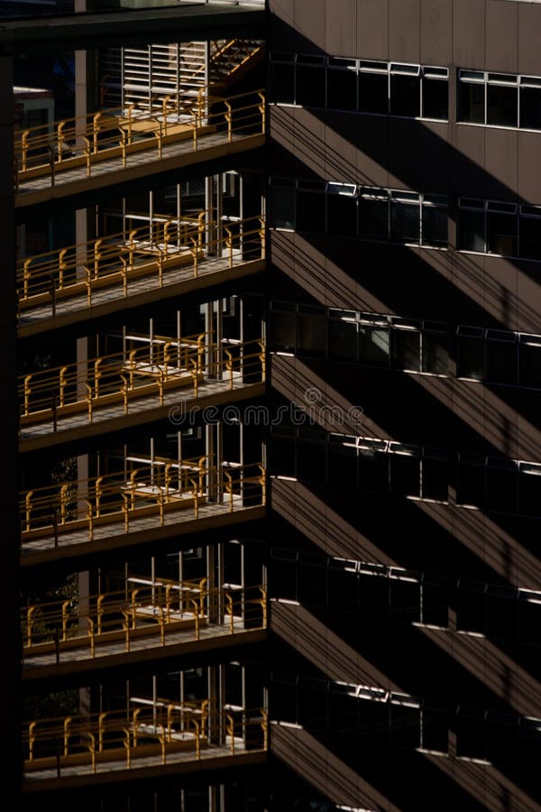 View of a High Building with Small Windows and Balconies Stock Photo ...