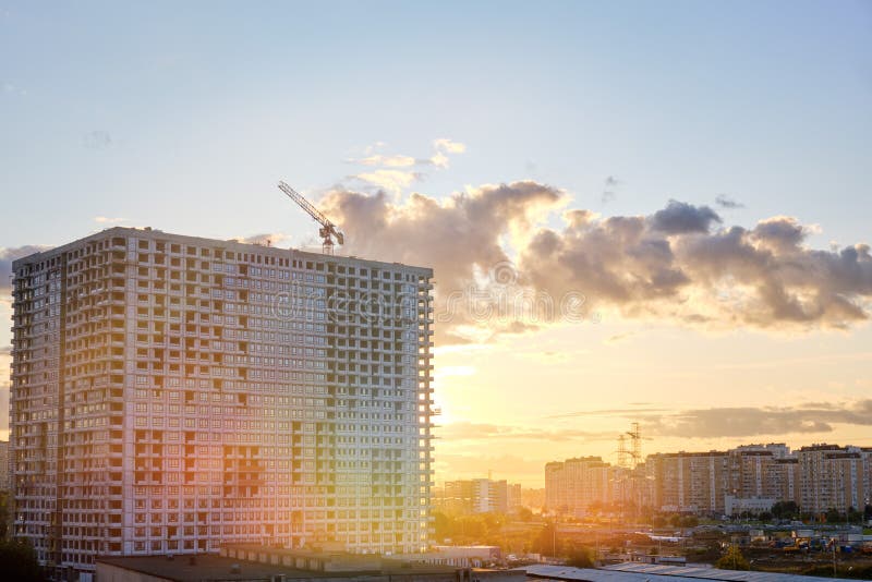View of a High-rise Building Under Construction at Sunset, Copy Space ...