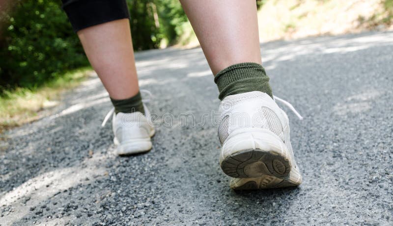 Back View Of Woman With Arms Raised In The Mountains Stock Photo ...