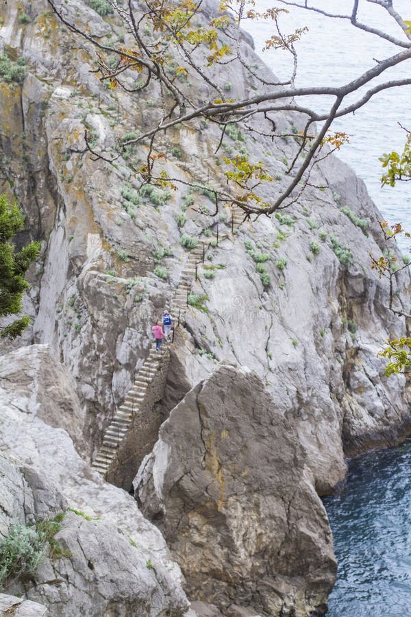 View of Hikers Climb the Stone Steps on the Rock Stock Photo - Image of ...