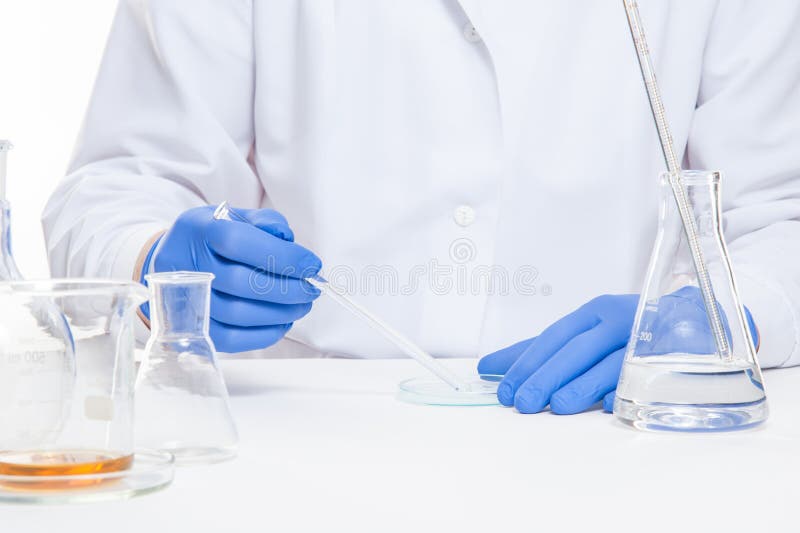 View of a Human Hands in the Laboratory while Performing Experiments ...