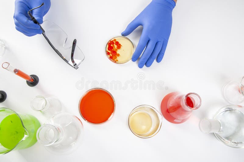 View of a Human Hands in the Laboratory while Performing Experiments ...