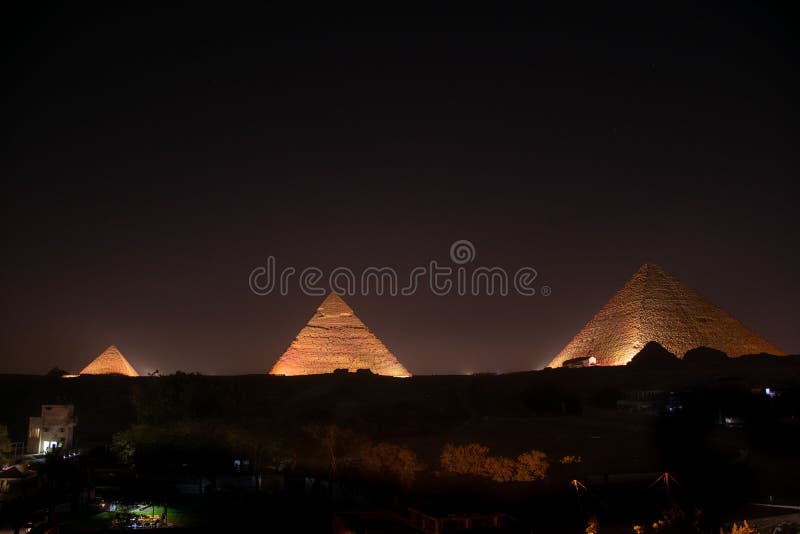 View of the Illuminated Pyramids of Giza in Egypt Stock Photo - Image ...