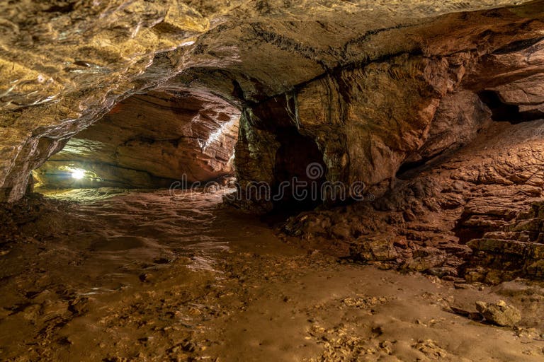 View Inside the Ancient Cave with Stone Walls with Additional Lighting ...