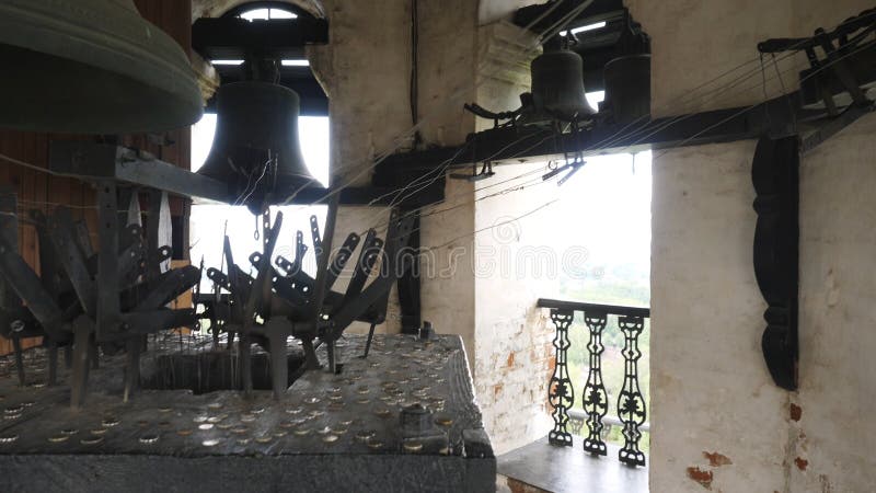 View Inside of Bell Tower of a Church. Stock Footage. Complex of Iron ...
