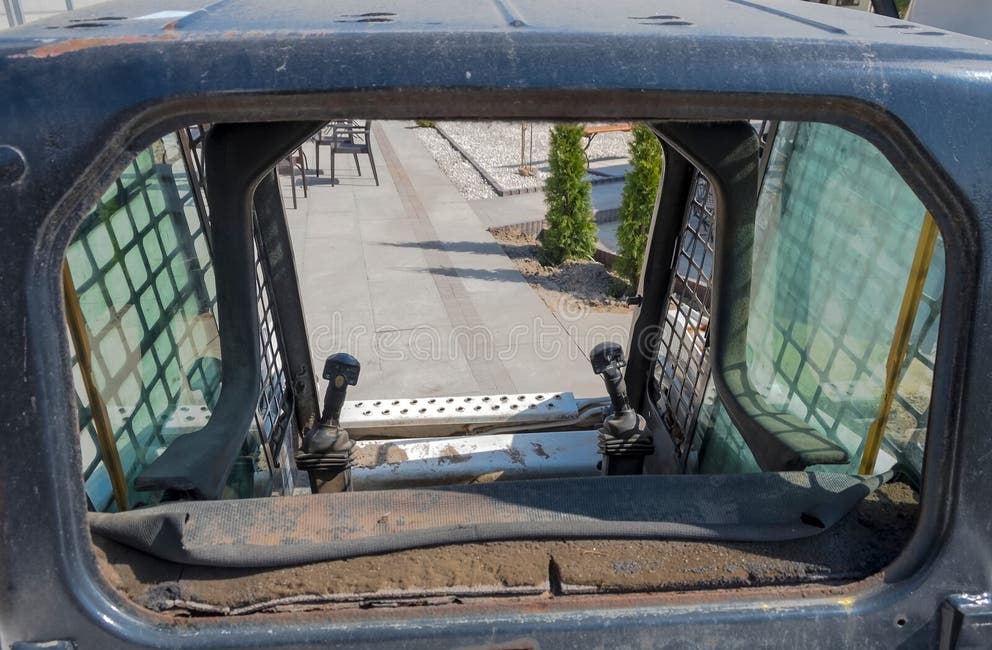 View from Inside the Cabin of a Small Loader on the Construction Site ...