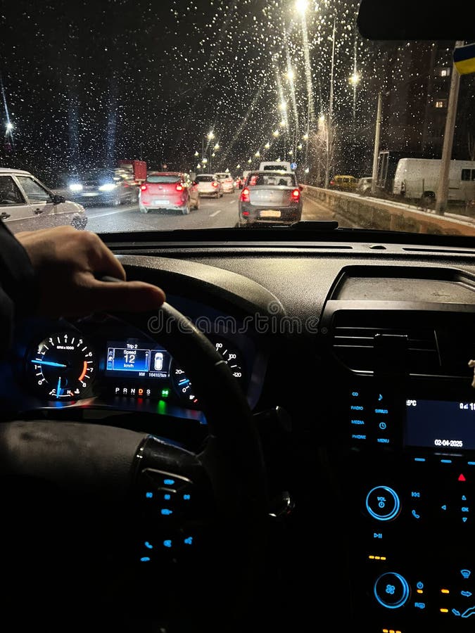 View from Inside a Car during Night Traffic with Rainy Windshield Stock ...