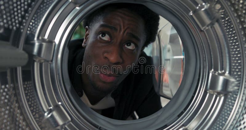 View from Inside the Drum, a Man Has Bought a New Washing Machine ...