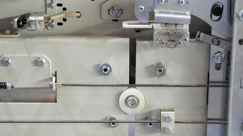 View Inside of Elevator Mechanism with Moving Stretched Metal Cable ...
