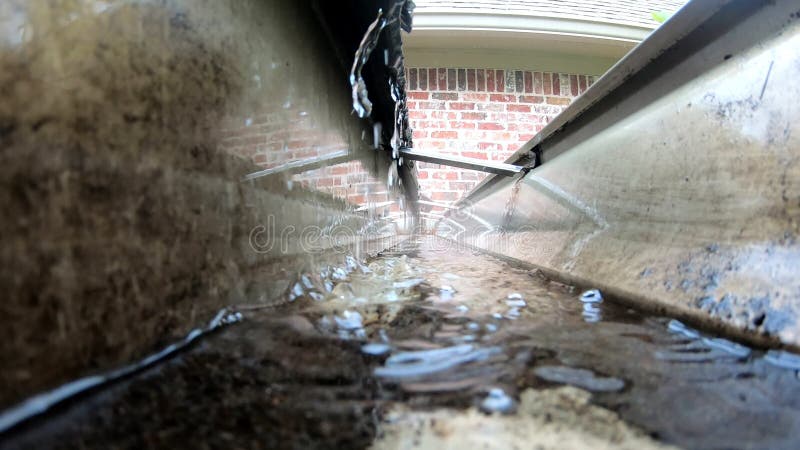 View Inside a Gutter during a Rain Storm Stock Video - Video of ...