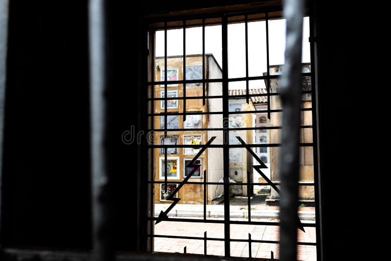 A View Inside of an Old Crypt into a Cemetery. Stock Image - Image of ...