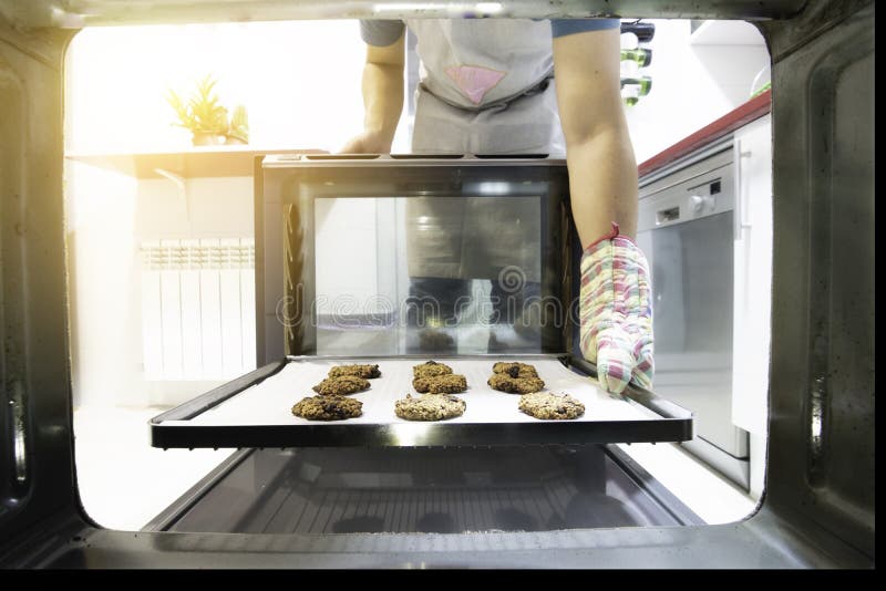 View from Inside the Oven of a Young Man Baking Cookies Stock Image ...