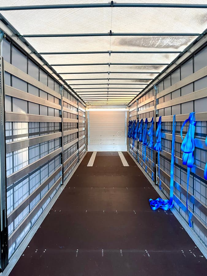 View Inside the Semi-trailer. Tie Straps for Securing Loads Hang on the ...