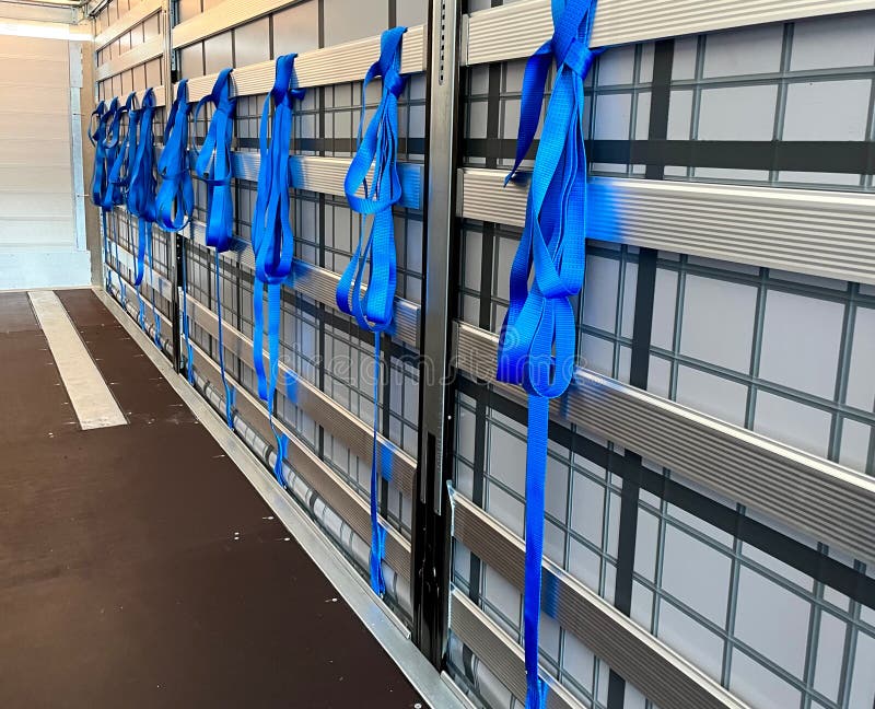 View Inside the Semi-trailer. Tie Straps for Securing Loads Hang on the ...